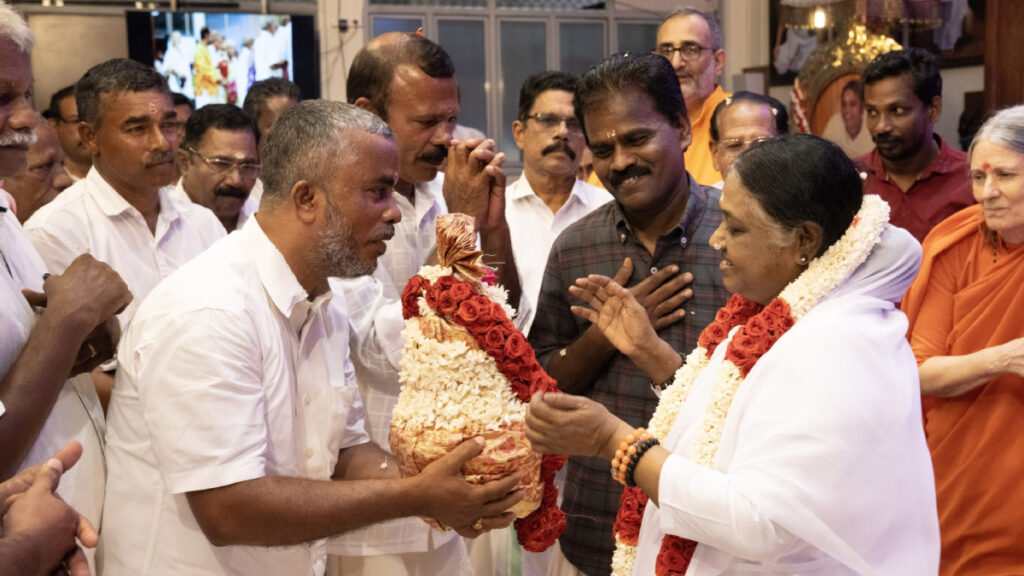 Local villagers express their love for Amma in an annual procession ...